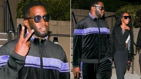 P Diddy Is All Smiles As He Flashes Peace Sign After Homes Were Raided