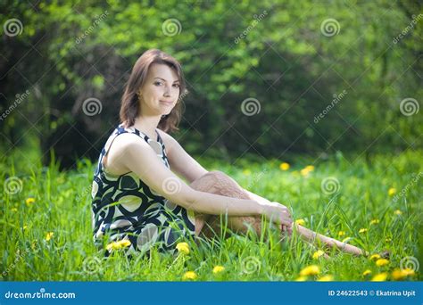 Beautiful Young Woman Sitting On The Grass Stock Image Image Of