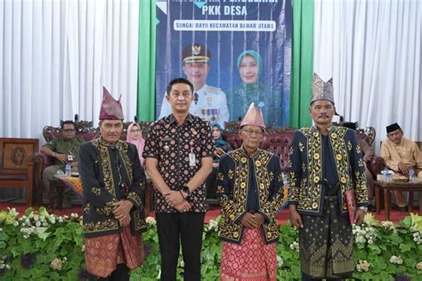 Pj Bupati Bachyuni Hadiri Pengukuhan Lam Desa Sungai Dayo