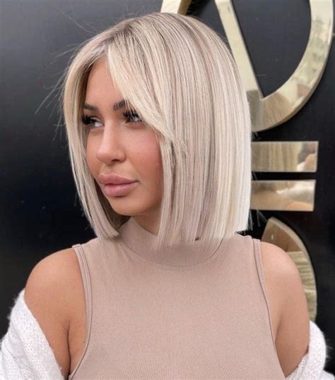 Blunt Bob With Razored Curtain Bangs Short Hair Syles Short Hair With