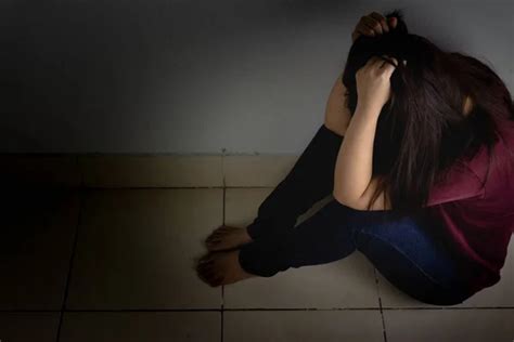 Sad Woman Hug Her Knee And Cry Sitting Alone In A Dark Room Dep