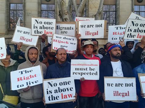 Video Migrants Arrested In Joburg Cbd Raids To Appear In Court The
