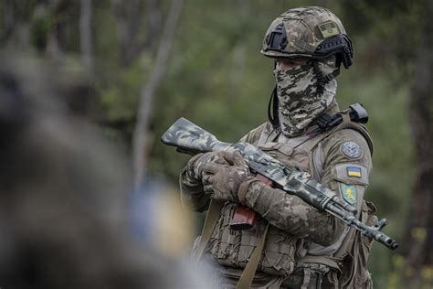 Rival Chechen Fighters Take War To Battlefields Of Ukraine