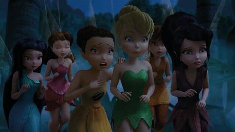Several Cartoon Characters Are Standing In Front Of Some Trees And One