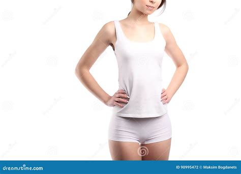 Corps De Jeune Femme Avec Les Culottes Blanches Et La Chemise De Coton