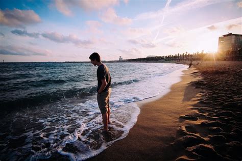 Free Images Man Beach Sea Coast Sand Rock Ocean Horizon