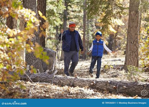 Asian Father And Son Hiking Together In A Forest Stock Image Image Of