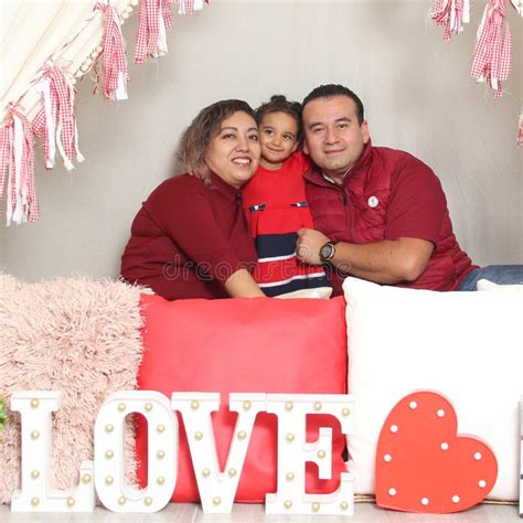 Latina Mom Dad And Daughter Show Their Affection Under A Teepee With A