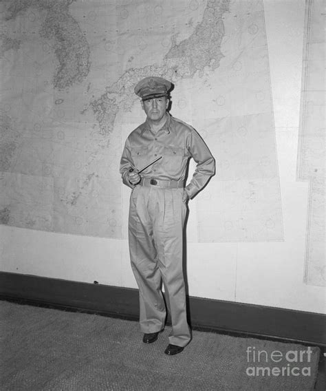 General Douglas Macarthur Holding Pipe By Bettmann