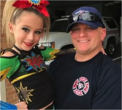 Stepdad Set Up Fake Photoshoot To Surprise Stepdaughter With Adoption