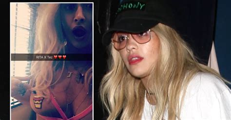Rita Ora Strips Off To Her Underwear And Flashes Her Cleavage In Very