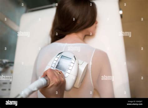 Young Beautiful Woman And Lpg Massage Procedure In Spa Clinic