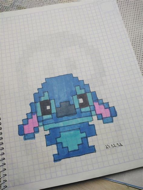 A Notebook With An Image Of A Cartoon Character Drawn In Squares On The