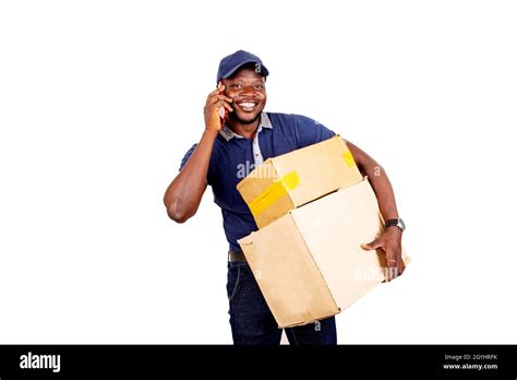 Happy Handsome Young Delivery Man Wearing Blue Uniform Talking On