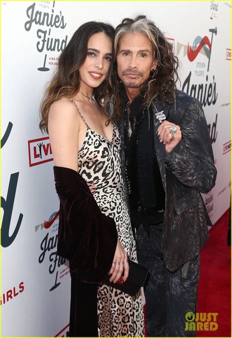 Steven Tyler And Girlfriend Aimee Preston Share A Smooch At Grammy