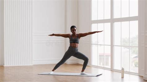 Sporty African American Woman Exercising With Jumping Rope At Home