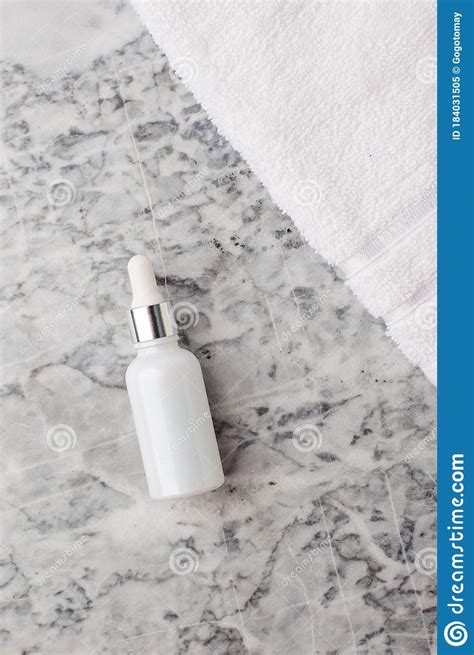Natural Beauty Cosmetic Product For Skincare Concept White Glass Vial