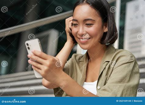 Portrait Of Asian Girl Takes Selfie On Mobile Phone Korean Woman