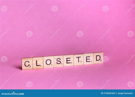 Closeted Words Represented By Wooden Letter Tiles Isolated On Colour