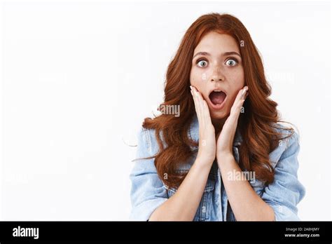 Close Up Shocked Gasping Speechless Young Redhead Woman In Denim Jacket