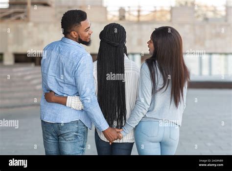Unfaithful African Man Cheating His Woman With Her Best Friend Stock