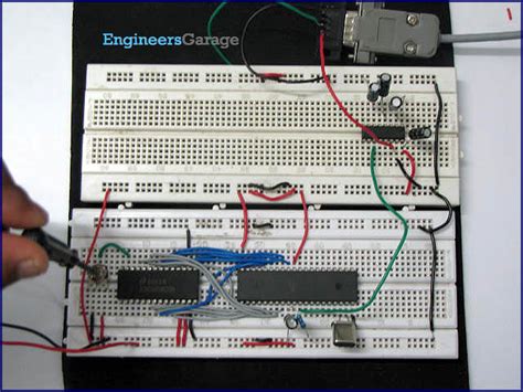 interfacing adc0808 with serial port rs232 using interrupt clock from