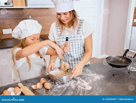 Funny Mother And Daughter Making Dough For Baking Stock Image Image