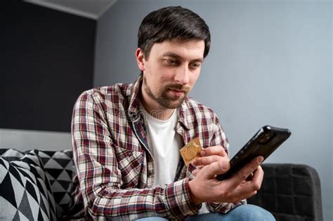 Safe Sex Concept Man Talking On Video Call With Girl Holds Gold