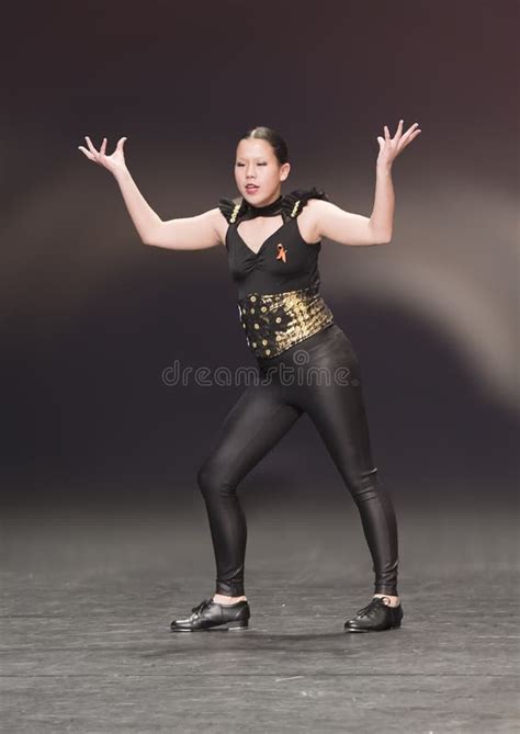 Lovely Thirteen Yearold Amerasian Girl Performing A Jazz Dance Stock