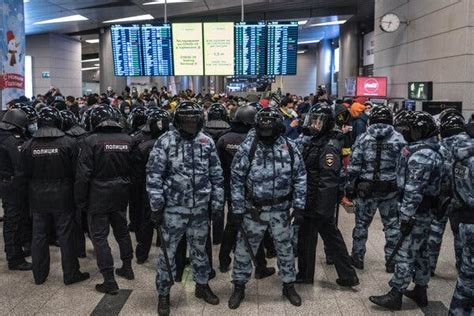 Navalny Arrested On Return To Moscow In Battle Of Wills With Putin