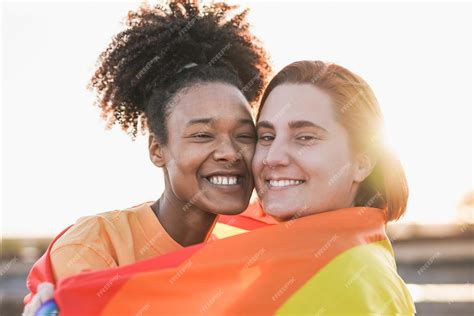 Premium Photo Mulitracial Lesbian Couple Hugging Together Outdoor