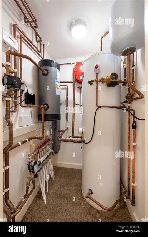 Domestic Air Source Heat Pump Installation For Underfloor Heating Stock