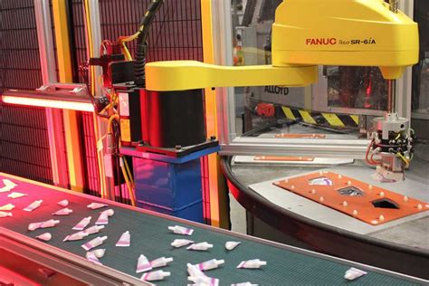 packaging equipment load and unload remtec robotics and automation