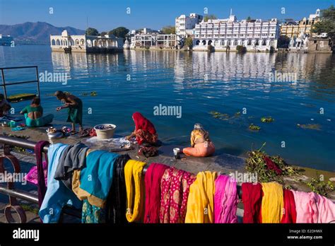 India Rajasthan State Udaipur Women Washing Clothes At The Naoghat On
