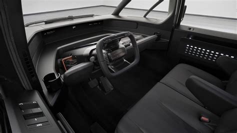 canoo s electric and extendable pickup truck includes pop out workspaces