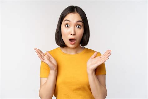 Free Photo Close Up Portrait Of Asian Woman Looking Surprised Wow
