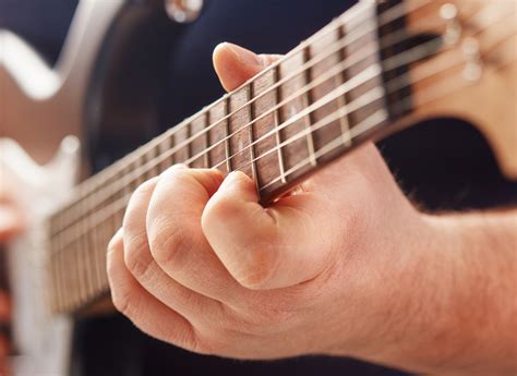 5 Best Wide Neck Acoustic Guitars For Fat Fingers In 2021