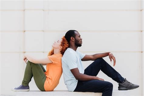 Free Photo Full Shot Of Upset Interracial Couple