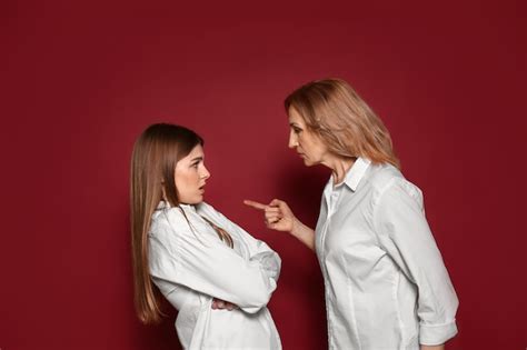 Premium Photo Mother Scolding Her Daughter On Color