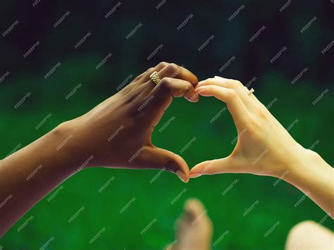 Premium Photo Hands Make Heart Shape Gesture