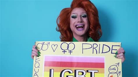 Happy Drag Queen Holding Gay Pride Banner Lgbt Concept Stock Video