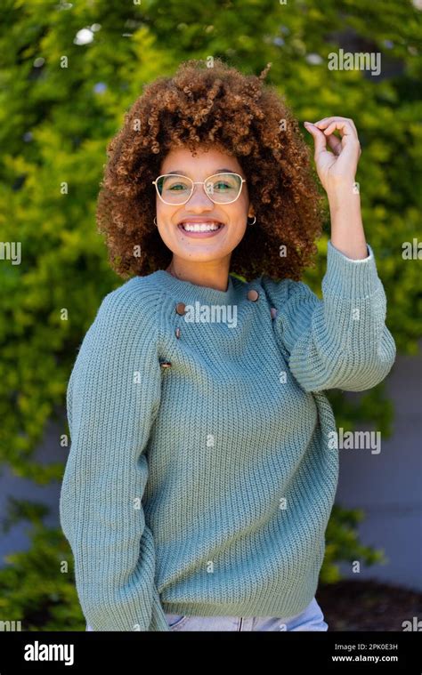 Portrait Of Happy Biracial Beautiful Young Woman With Afro Hair