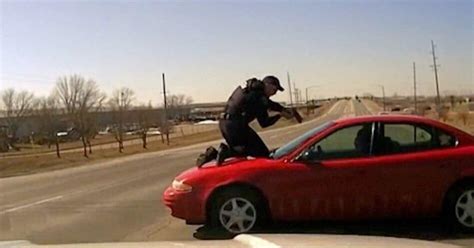 Body Cam Footage Shows Iowa Police Officer Clinging To Hood Of Car