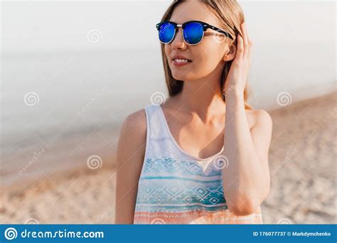 Young Girl Posing Standing On The Beach On A Sunny Day Stock Image