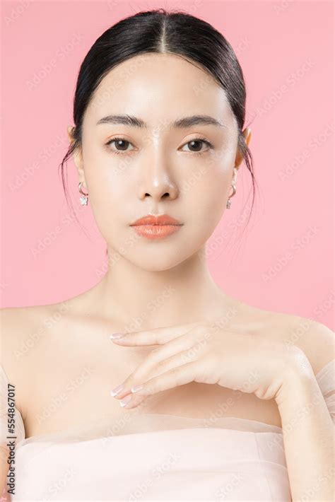 Asian Woman With A Beautiful Face And Perfect Clean Fresh Skin Cute