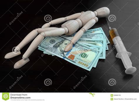 wooden adult human figurine dollar cash and medical
