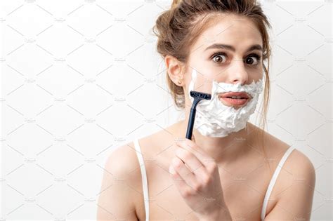 Woman Shaving Her Face By Razor Featuring Woman Face And Shaving