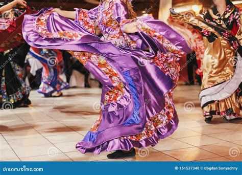 Beautiful Gypsy Girls Dancing In Traditional Colorful Clothing Roma