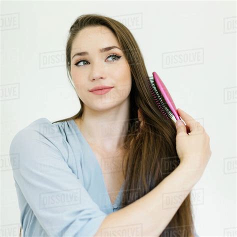 Woman Brushing Hair