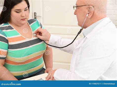 Doctor Listening To Patient`s Heartbeat Stock Image Image Of